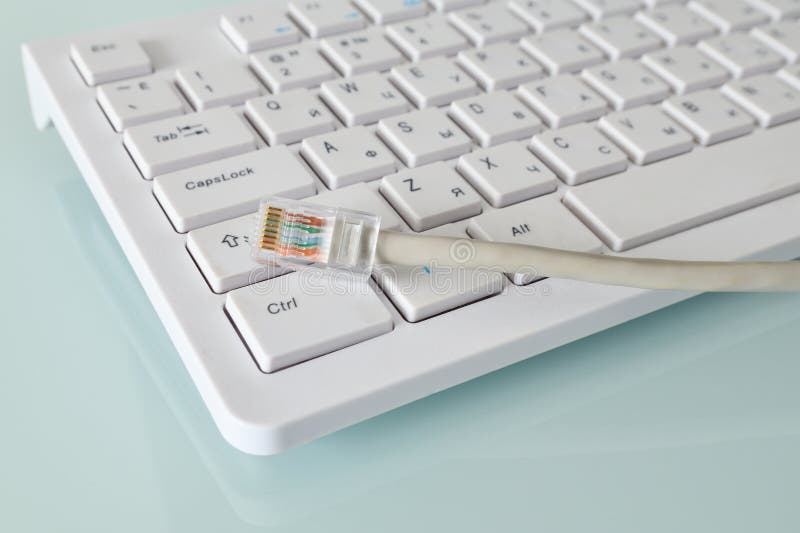 Internet Wire Lies on a White Computer Keyboard Stock Image - Image of ...