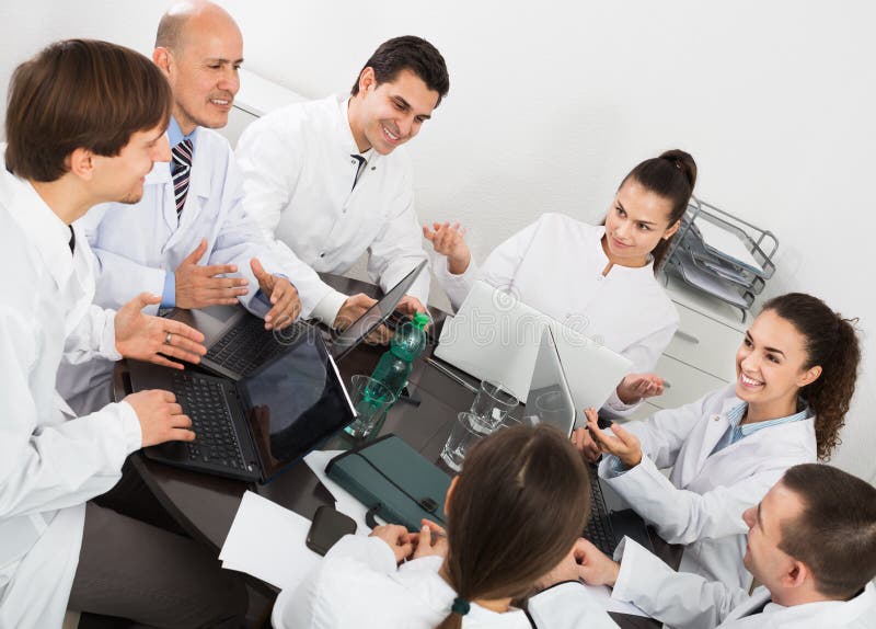Interns and Professor at Hospital Meeting Stock Photo - Image of health ...