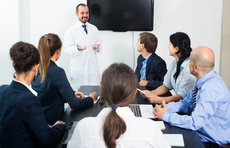 Interns and Professor at Meeting Stock Image - Image of ...