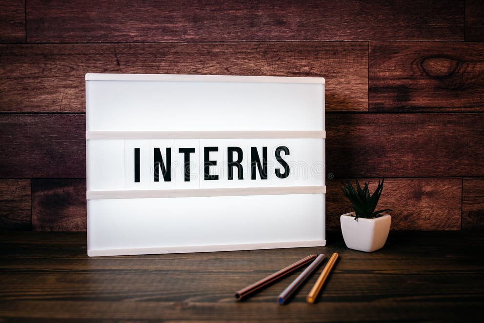 Interns. Text in lightbox stock image. Image of academy - 150889363
