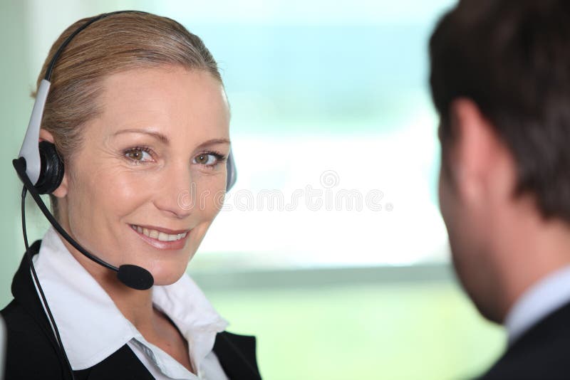 Interpreter smiling stock image. Image of smiling, brown - 23351257