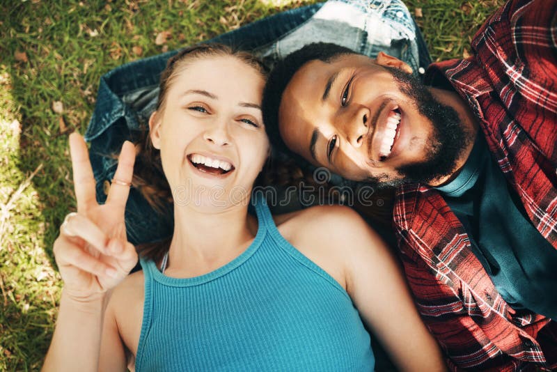 Interracial Couple Park And Portrait Selfie For Lying Relax Or Grass