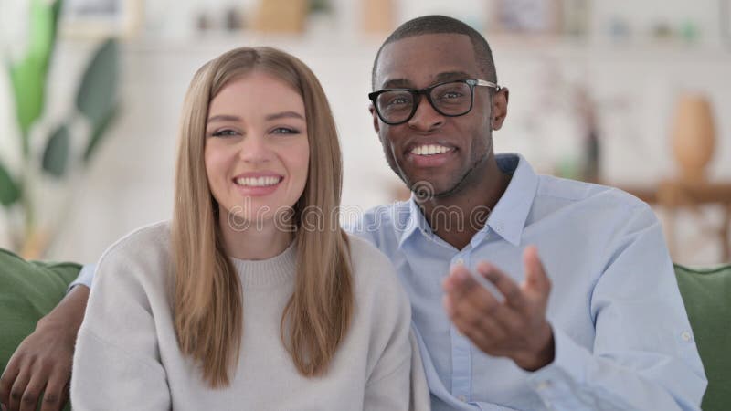 Interracial Couple Talking on Video Call at Home Stock Photo - Image of ...