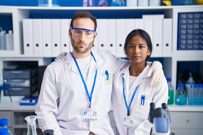 Interracial Couple Working at Scientist Laboratory Thinking Attitude ...