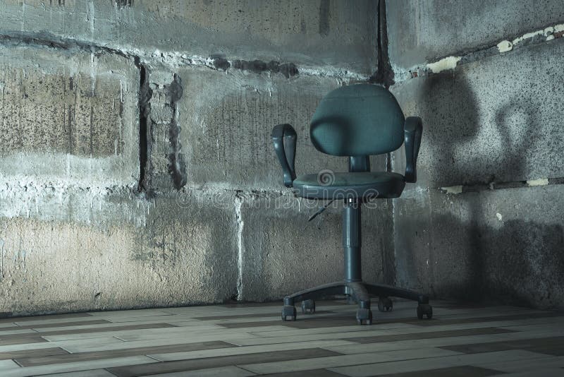 The Interrogation Chair. an Old Chair in a Concrete Basement Stock ...