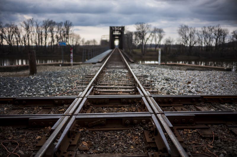 Intersecting Railroad Tracks Stock Photo - Image of corrosion, dusk ...