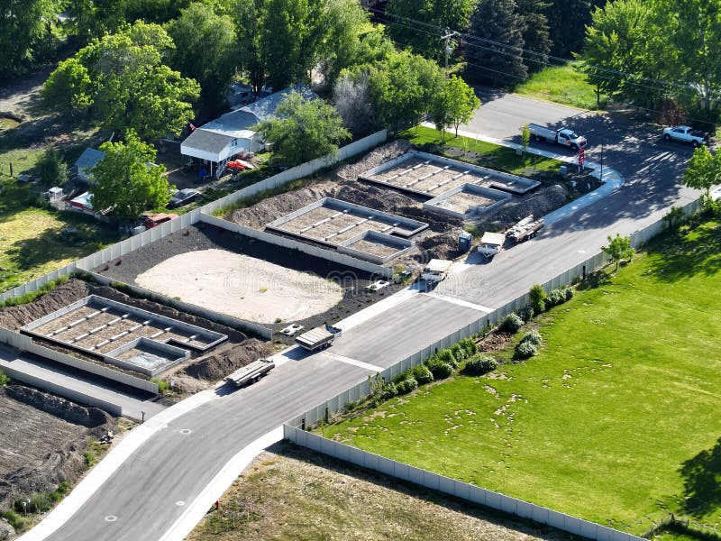 The Intersection is Being Built between Two Roads and an Open Parking ...