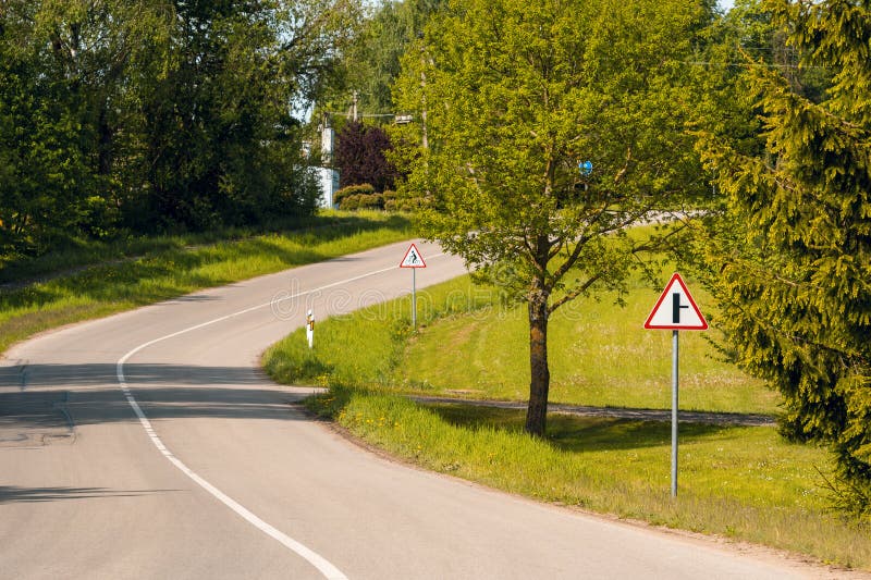 Intersection with Minor Side-road on the Right Sign Stock Photo - Image ...
