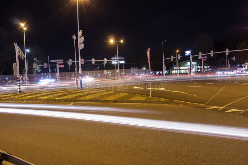 Intersection at Night with Traffic Blurred by Motion Stock Image ...