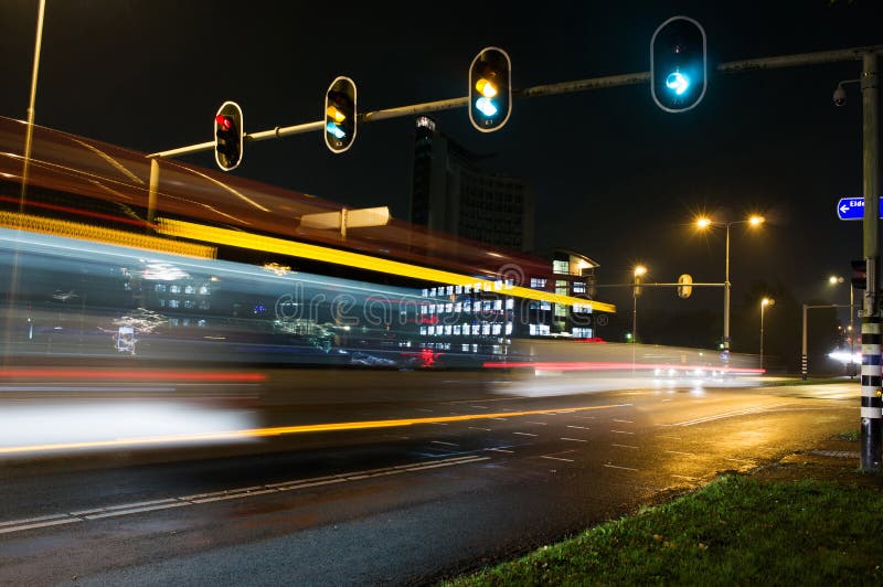 Intersection with a Row Cars at Night, Netherlands Stock Image - Image ...