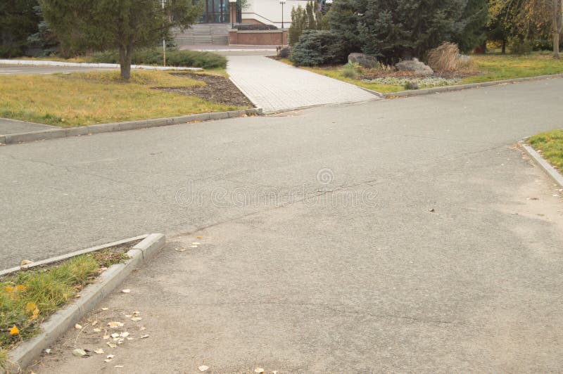 The Intersection of Paved Paths Surrounded by a Lawn with Free-standing ...