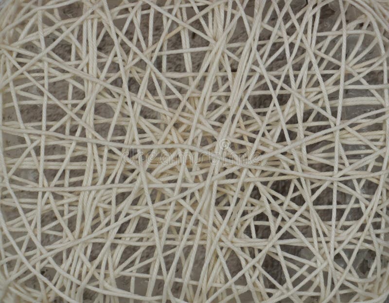 Intertwined beige threads. stock image. Image of threadscloseup - 375955577