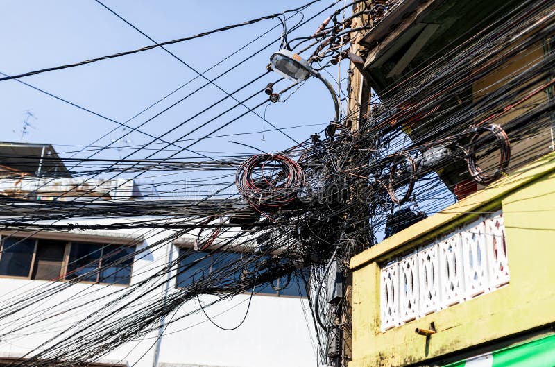 Intertwined Electric Wires in Front of Buildings Which is the First ...