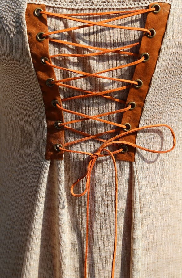 Intertwining with the String of an Ancient Medieval Dress in Cot Stock ...