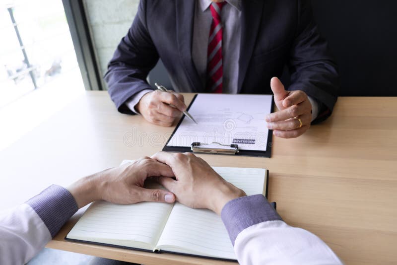 Interview Employee Talking about Resume and Job Description with the ...