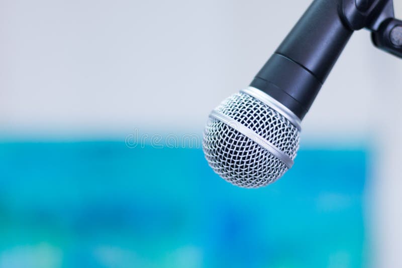 Interview Situation: Black Microphone on Tripod, Blurry Background ...