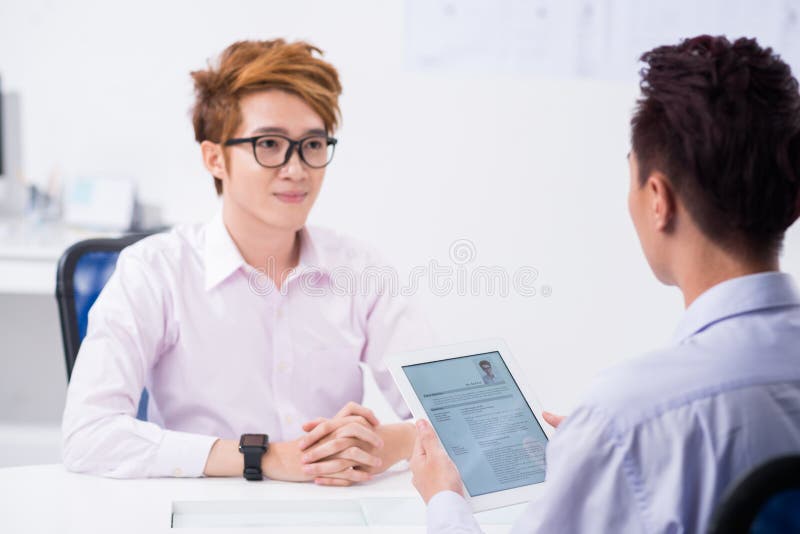 Interviewing applicant stock photo. Image of technology - 58894658