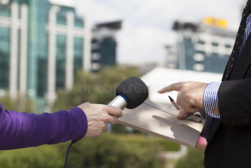 Interviewing a businessman stock photo. Image of interviewing - 41740386