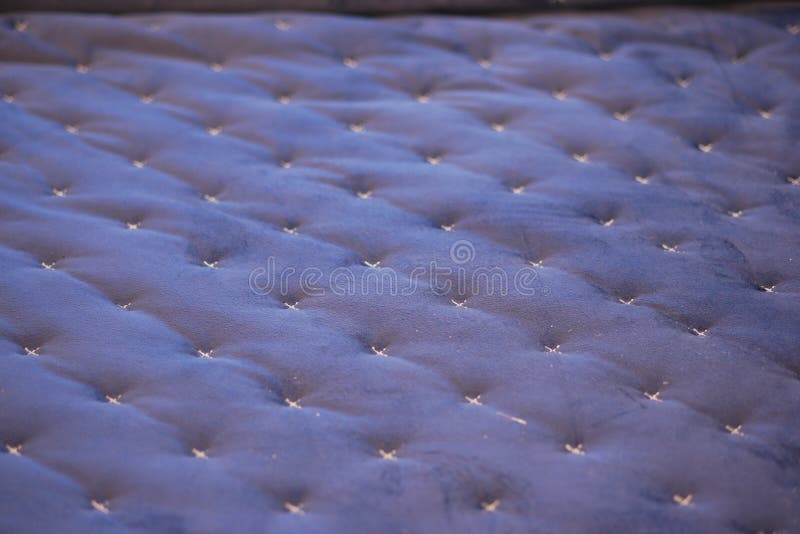 An Intimate CloseUp of the Surface of a Plush Mattress Featuring ...