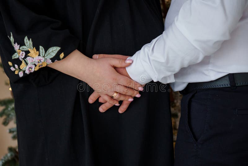 Intimate Moment: Couples Holding Hands in Celebration of Love and ...