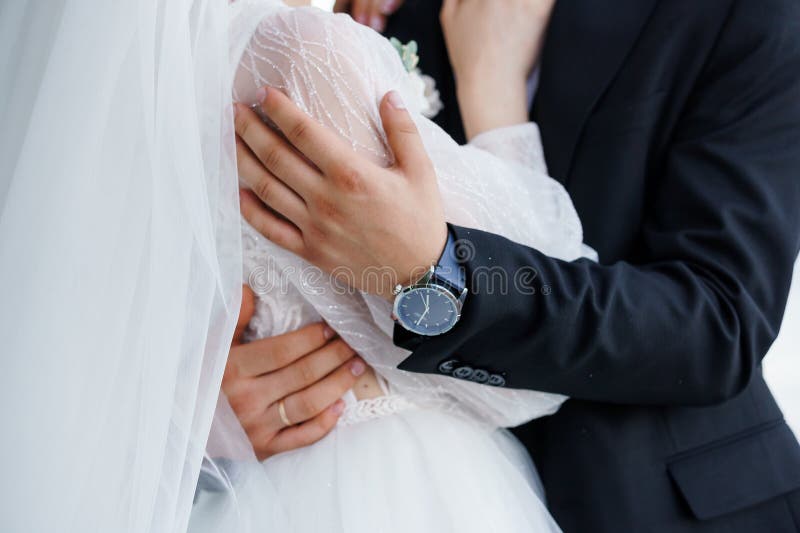 Intimate Moment of a Newlywed Couple Embracing with Elegance Stock ...