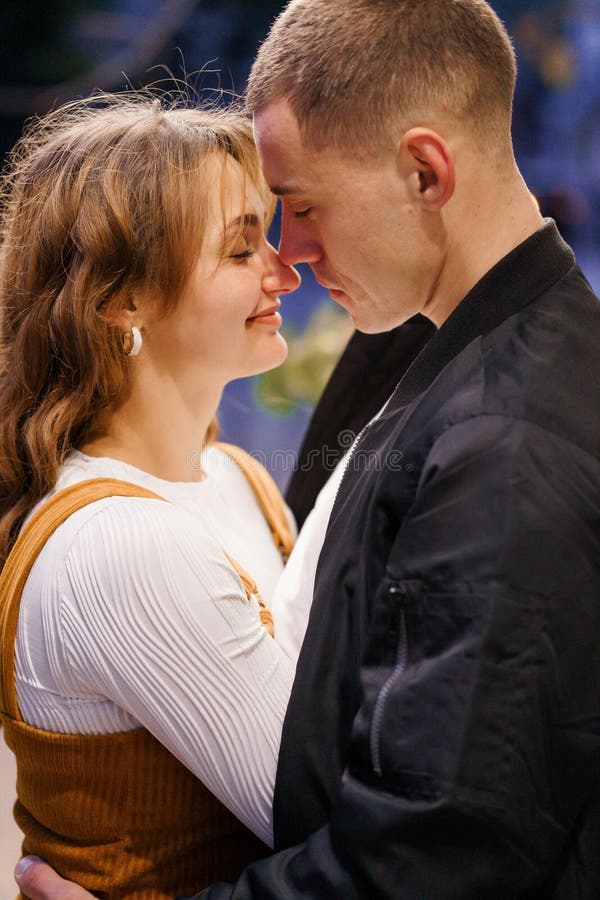 Intimate Moment between Two Young Lovers in a Warm Embrace Stock Image ...