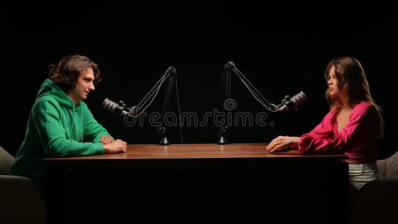 Engaging Discussion Unfolds in a Cozy Podcast Studio with Two ...