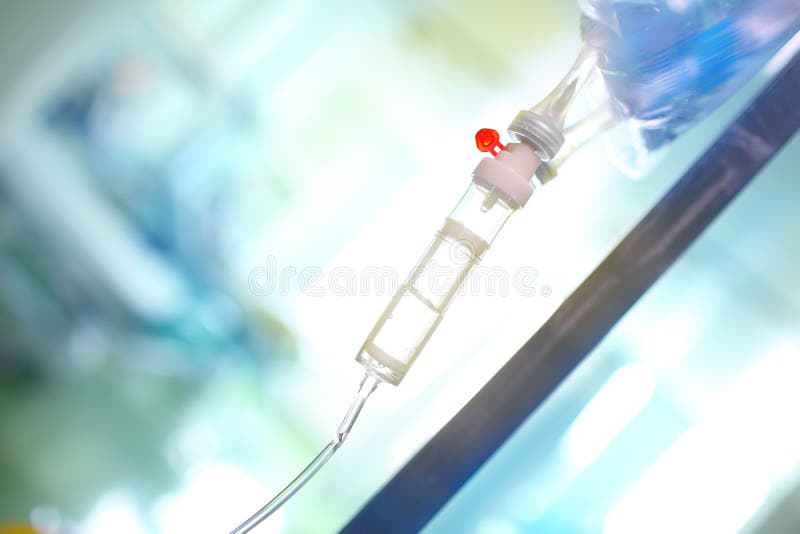 IV Drip System and Vial with Medication. Stock Photo - Image of liquid ...