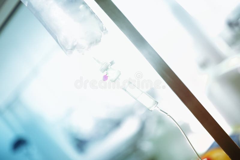 IV Drip System and Vial with Medication. Stock Photo - Image of liquid ...