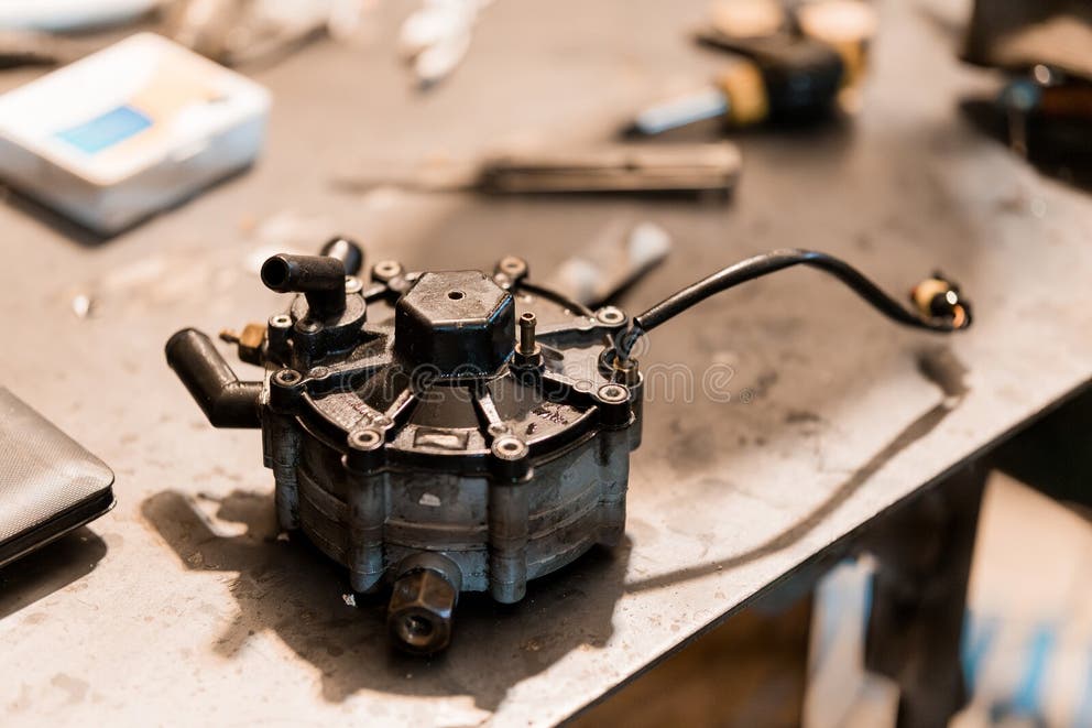 Intricate Fuel Pump Component on Workshop Table Stock Image - Image of ...