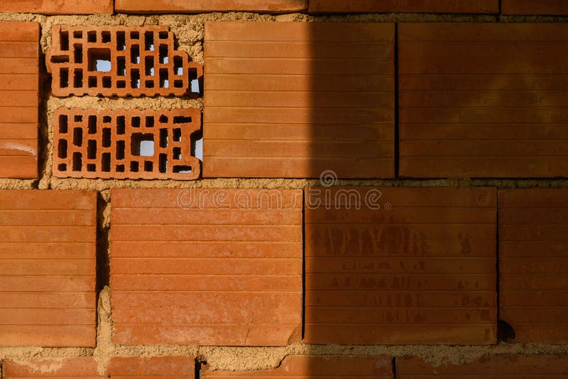 Intricate Patterns in a Warm-toned Brick Wall Revealing Craftsmanship ...