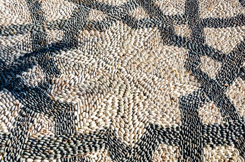 Intricate Pebble Pattern Creating Star Shapes Stock Photo - Image of ...
