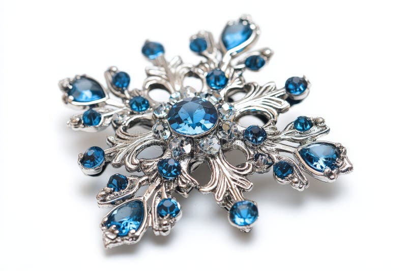 Intricate Silver Snowflake Brooch with Sparkling Blue Gemstones Stock ...