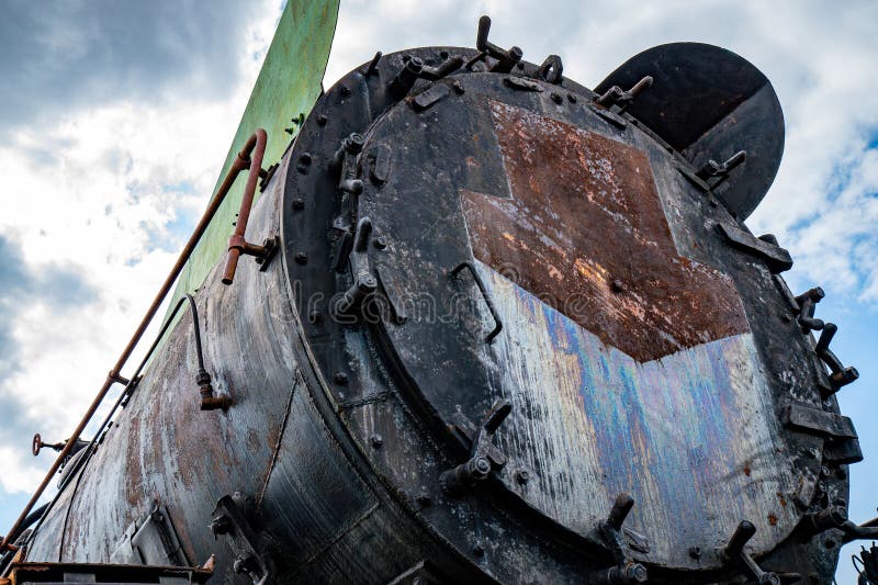 Details of an Old Rusty Steam Train Under a Cloudy Sky Stock Image ...