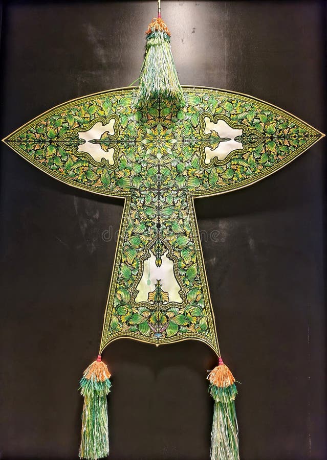 Intricately Designed Traditional Kite with Elegant Patterns on a Dark ...