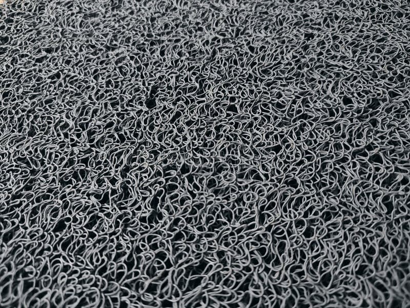 A Grey Welcome Mat that is Usually Placed in Front of the Door Stock ...