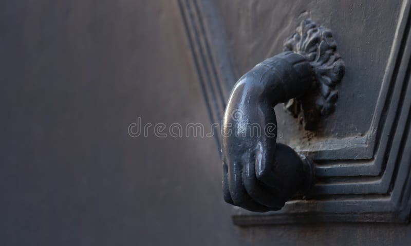An Intriguing and Captivating Door Handle Sculpture Featuring an ...