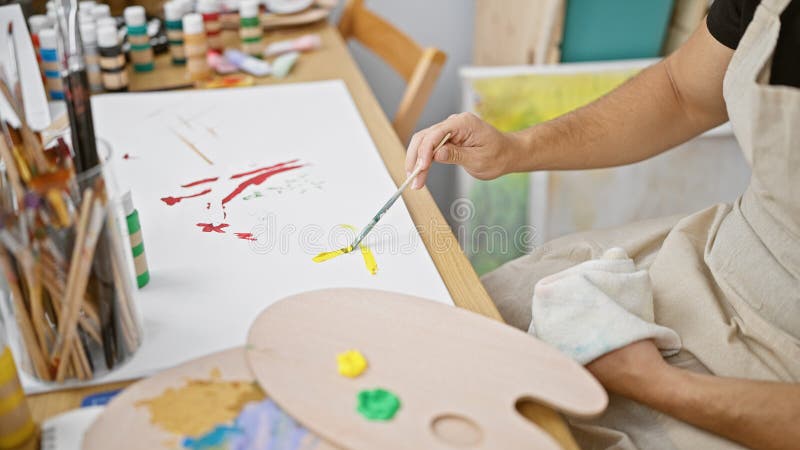 Intriguing Glimpse of a Handsome Young Hispanic Man, Artist in His ...