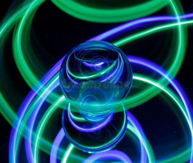 Intriguing Green and Blue Light Emanating from a Light Bulb in a Dimly ...