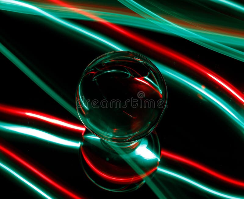 Intriguing Green and Red Light Emanating from a Light Bulb in a Dimly ...