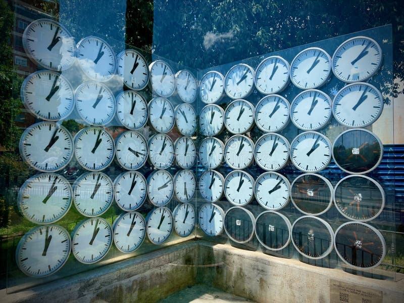 Multiple Clocks Displaying Different Times Reflect Urban Life and ...