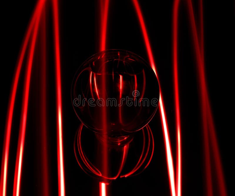 Intriguing Red Light Emanating from a Light Bulb in a Dimly Lit Setting ...