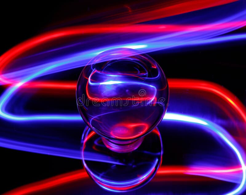 Intriguing Red and Purple Light Emanating from a Light Bulb in a Dimly ...