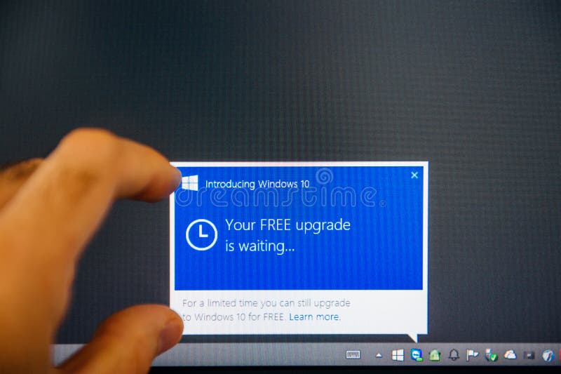 Introducing Windows 10 Message on Computer Display Man Touching ... Introducing Windows 10 Message on Computer Display Man Touching ...