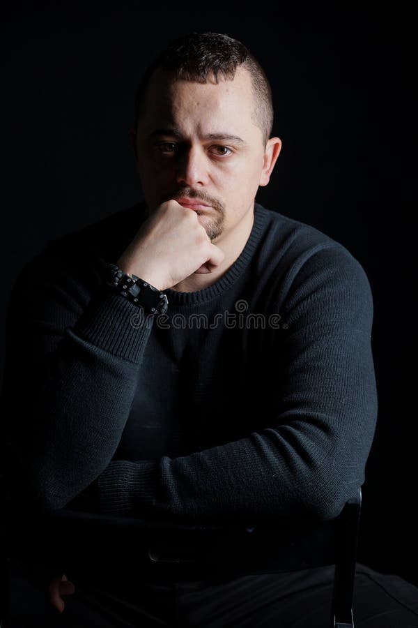 Introspective Man in Dramatic Lighting Stock Image - Image of moody ...