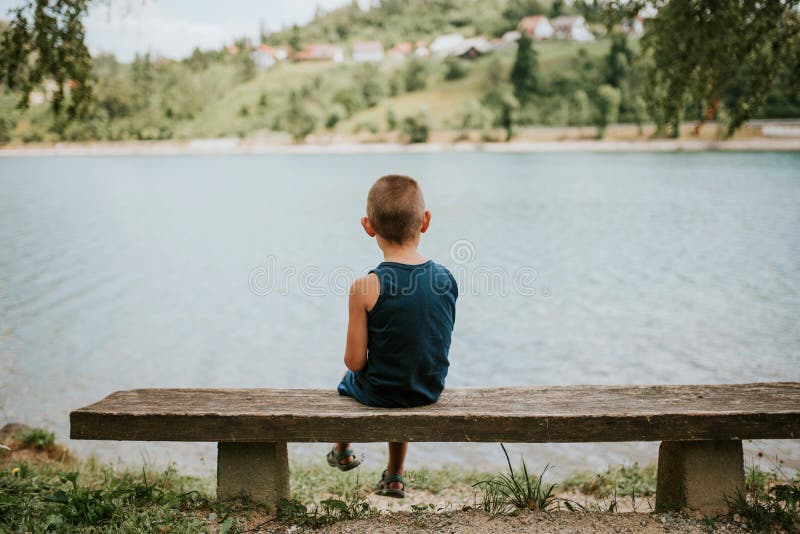 Introverted Boy Sitting Lake Stock Photos - Free & Royalty-Free Stock ...