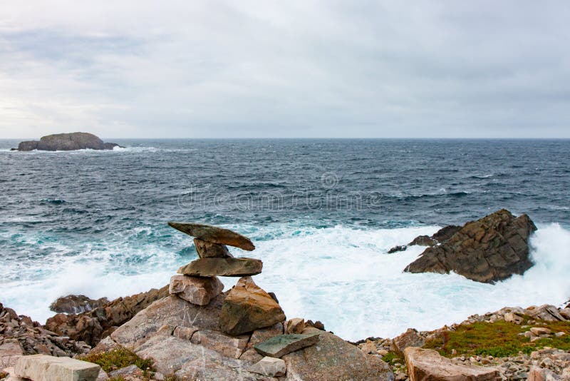 Inukshuk and Surf at the Coast of Newfoundland Stock Photo - Image of ...