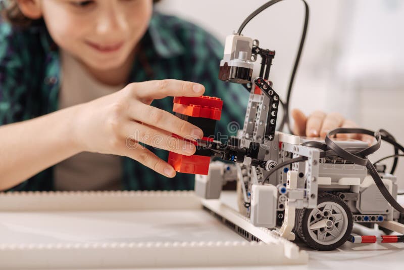 Inventive Teen Kid Constructing Robot in the Studio Stock Photo - Image ...