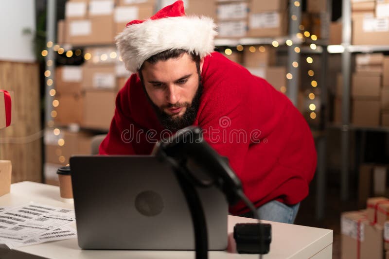 Inventory Manager Using Laptop Computer in Storeroom, Preparing ...
