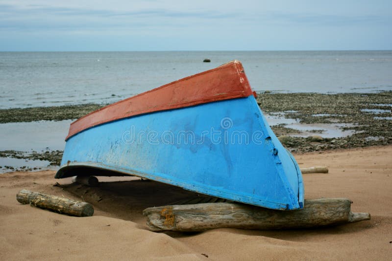 Inverted Blue Red Boat Beach Stock Photos - Free & Royalty-Free Stock ...